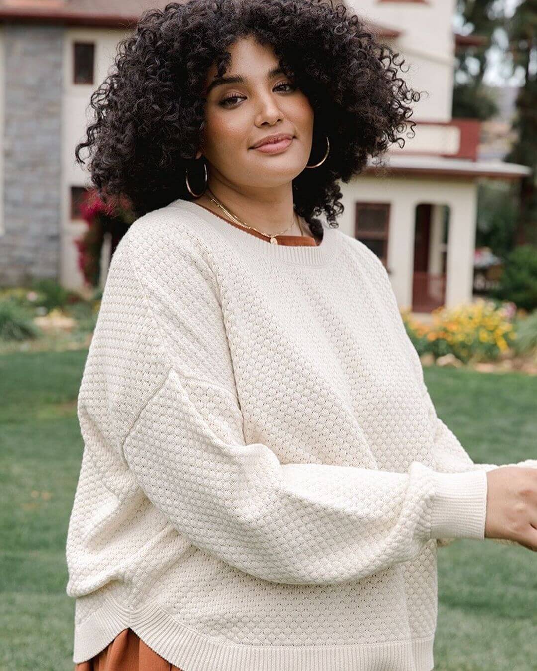 15 Sustainable Plus Size Sweaters to Get Snug This Winter